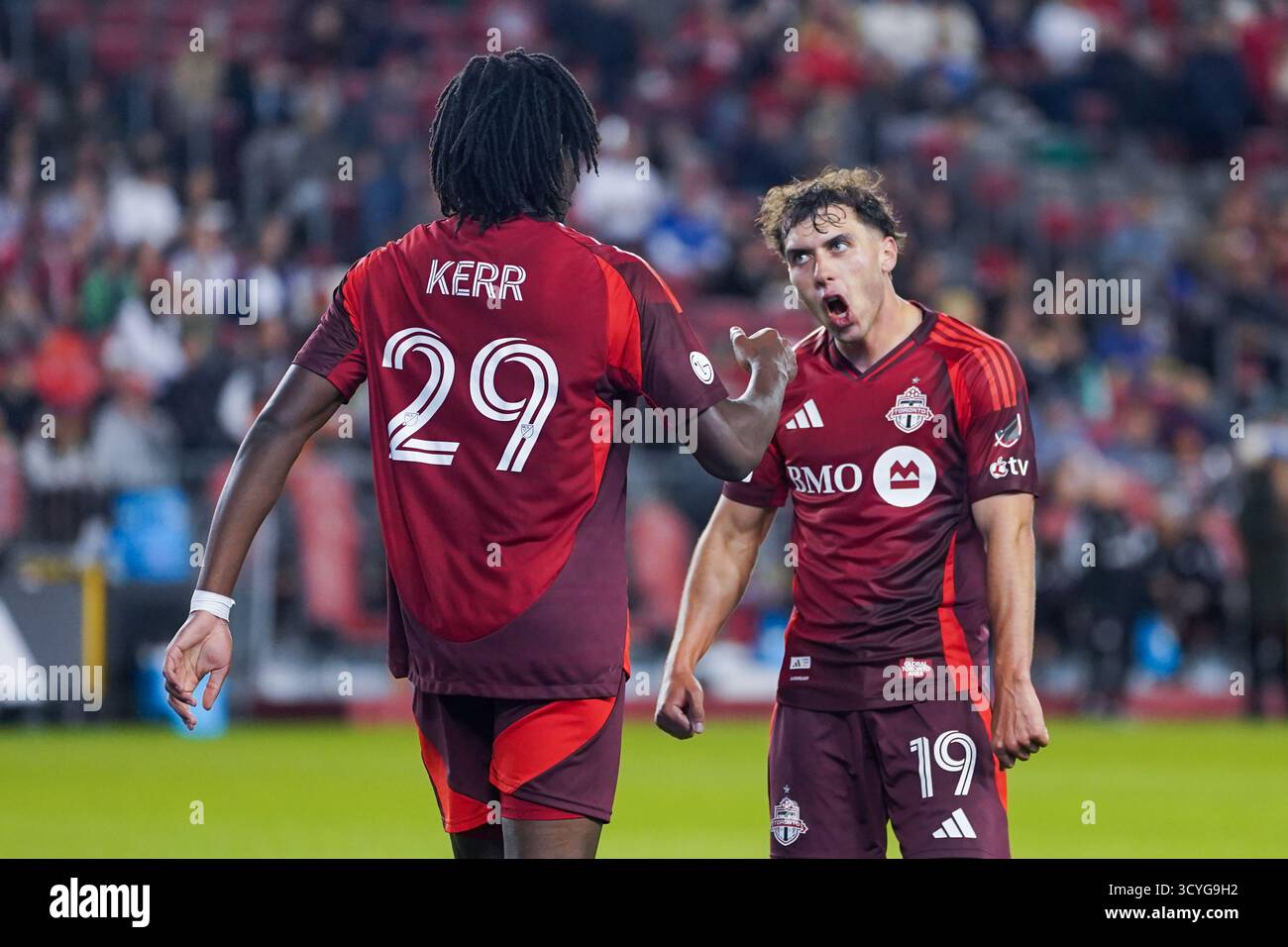 Deandre Kerr #29 of Toronto FC and Kobe Franklin #19 of Toronto FC ...