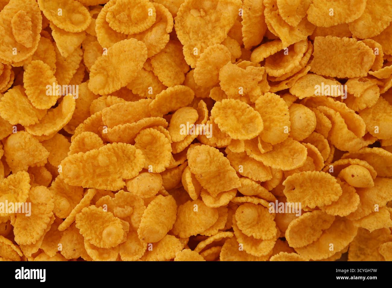 Corn flakes background and texture close up. Top view cornflake cereal ...
