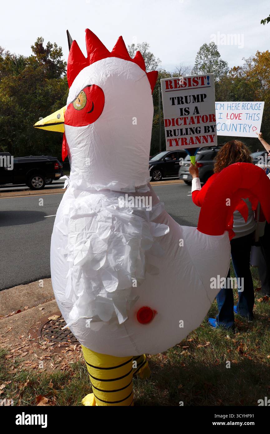 Inflatable Rooster Protests at US Rally Against Trump Stock Photo - Alamy