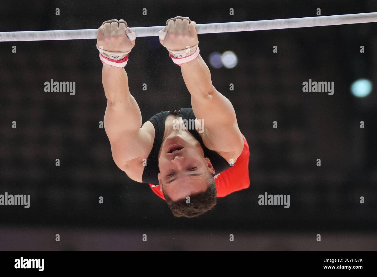 Noe Seifert of Switzerland competes on the horizontal bar during the ...