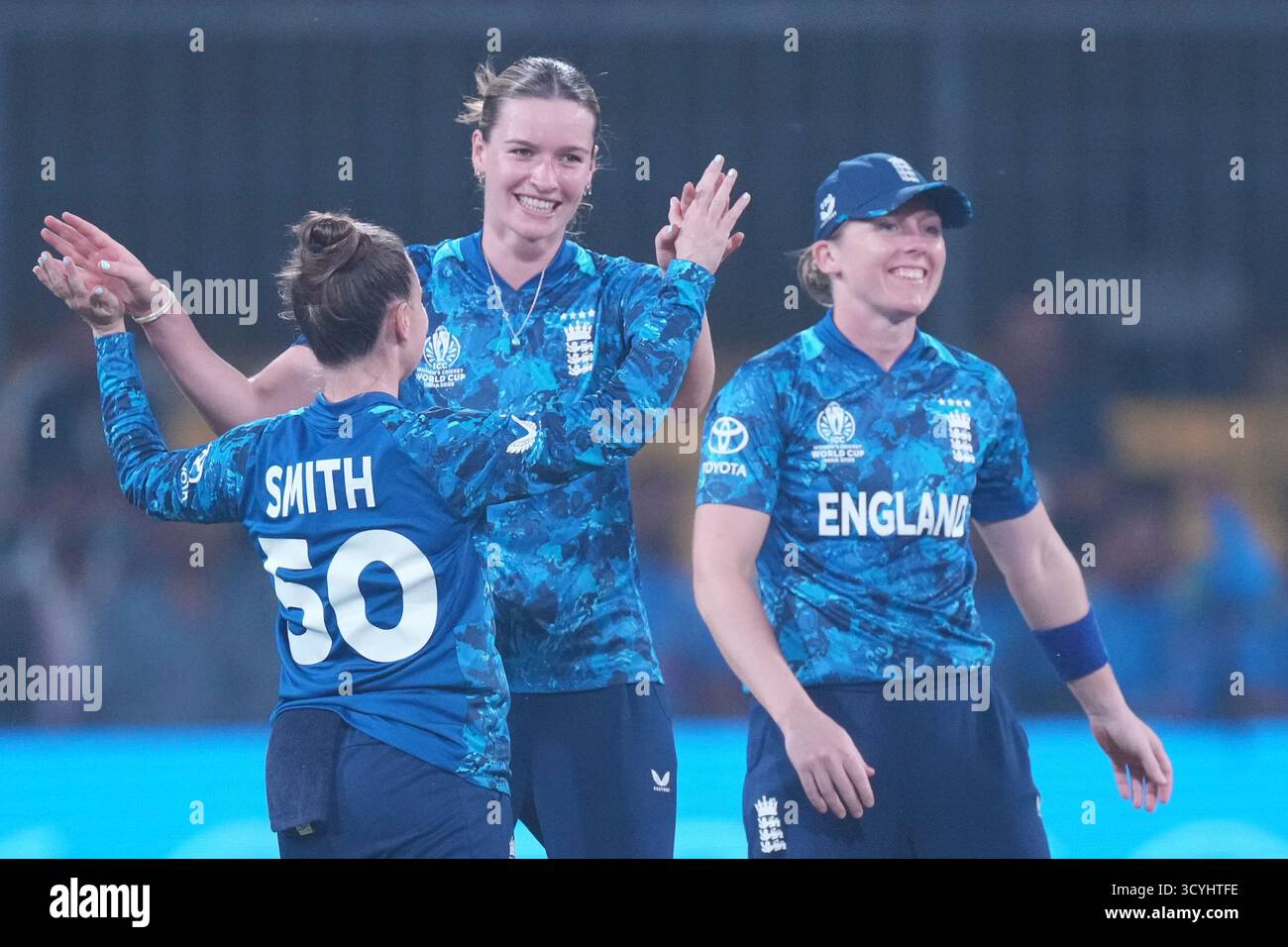 England's Lauren Bell, center, celebrates with teammate the wicket of ...