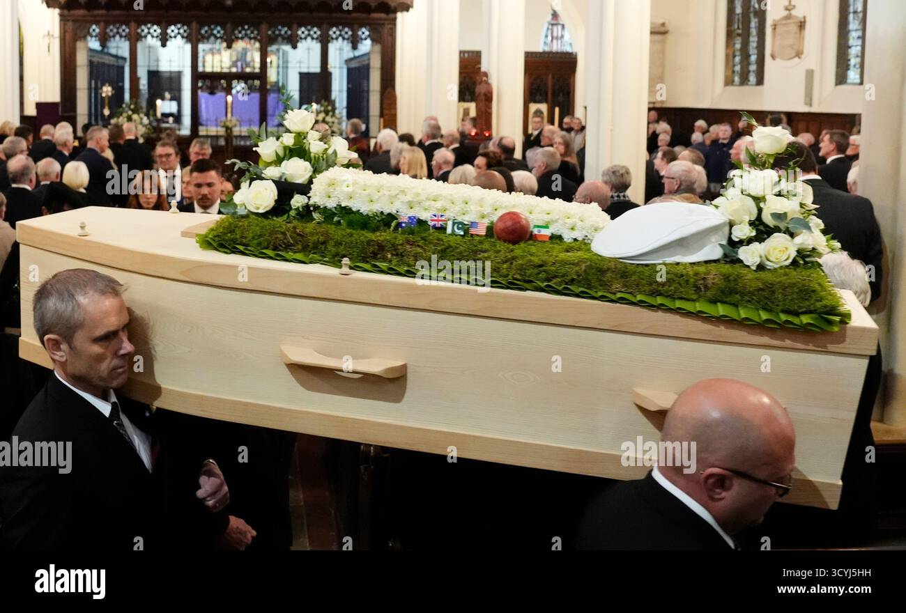 The coffin of former cricket umpire Dickie Bird is carried out of St ...