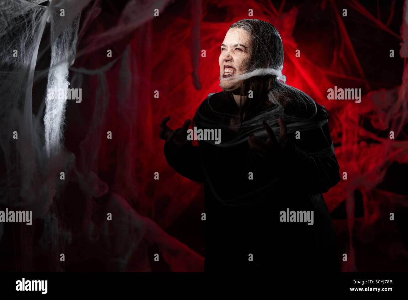 Angry creepy woman covered hi-res stock photography and images - Alamy