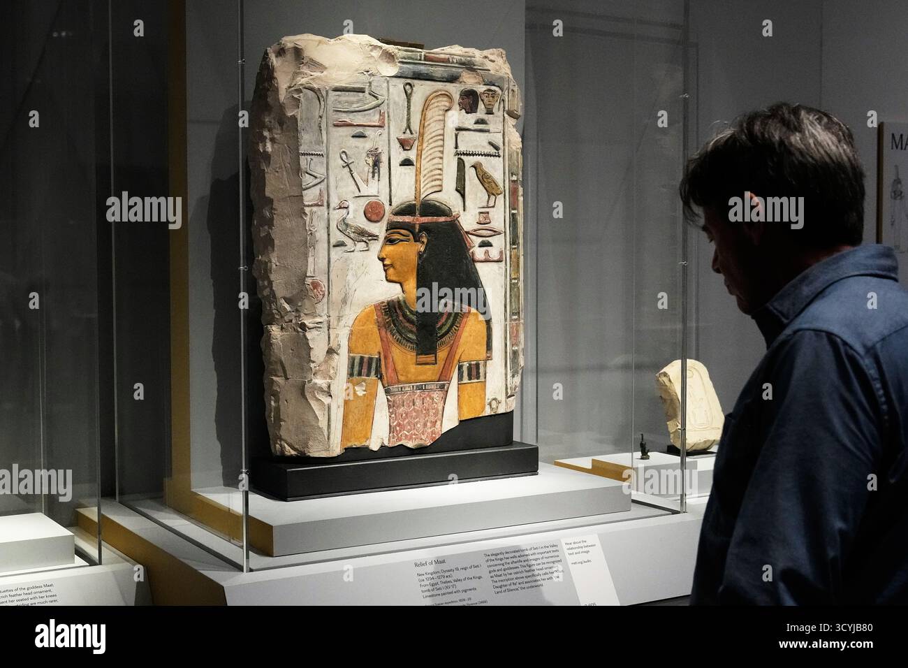 A relief of Maat is displayed in the Divine Egypt exhibition, at the ...