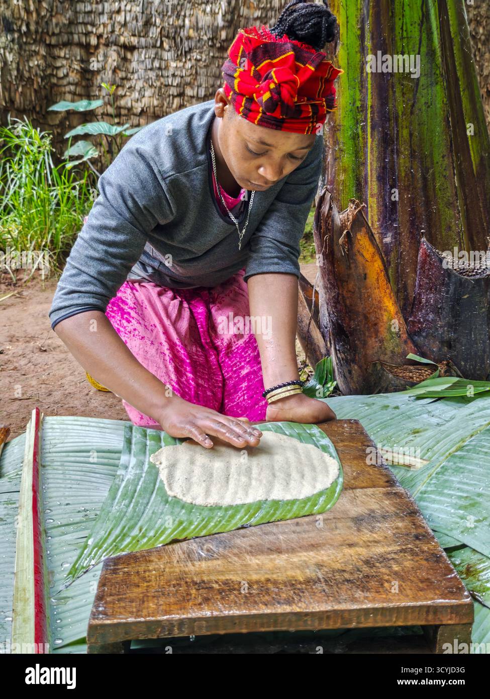 Dorze, Ethiopia - 17 August 2025: woman preparing food at Dorze village ...