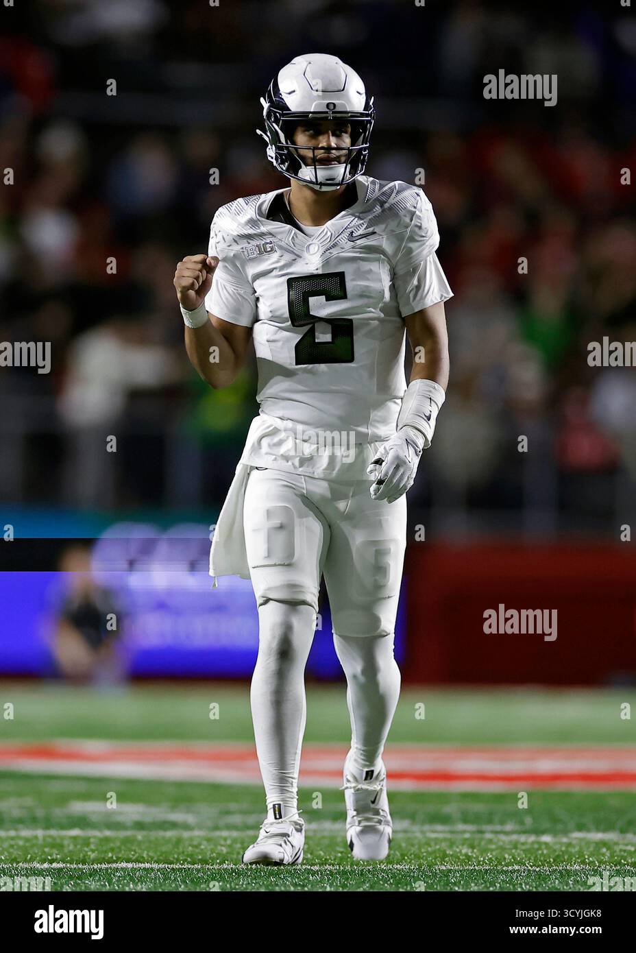 Oregon quarterback Dante Moore (5) reacts after a touchdown during the ...