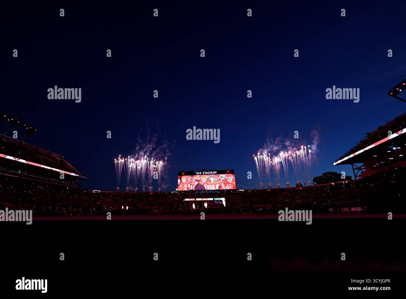 Fireworks explode as Rutgers takes the field before the first half of ...