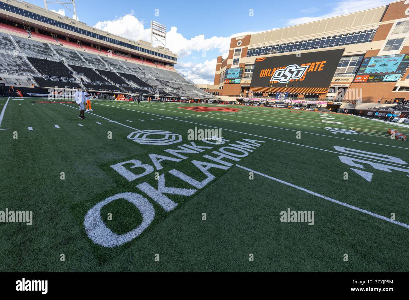 Logos on the Oklahoma State field before an NCAA college football game ...