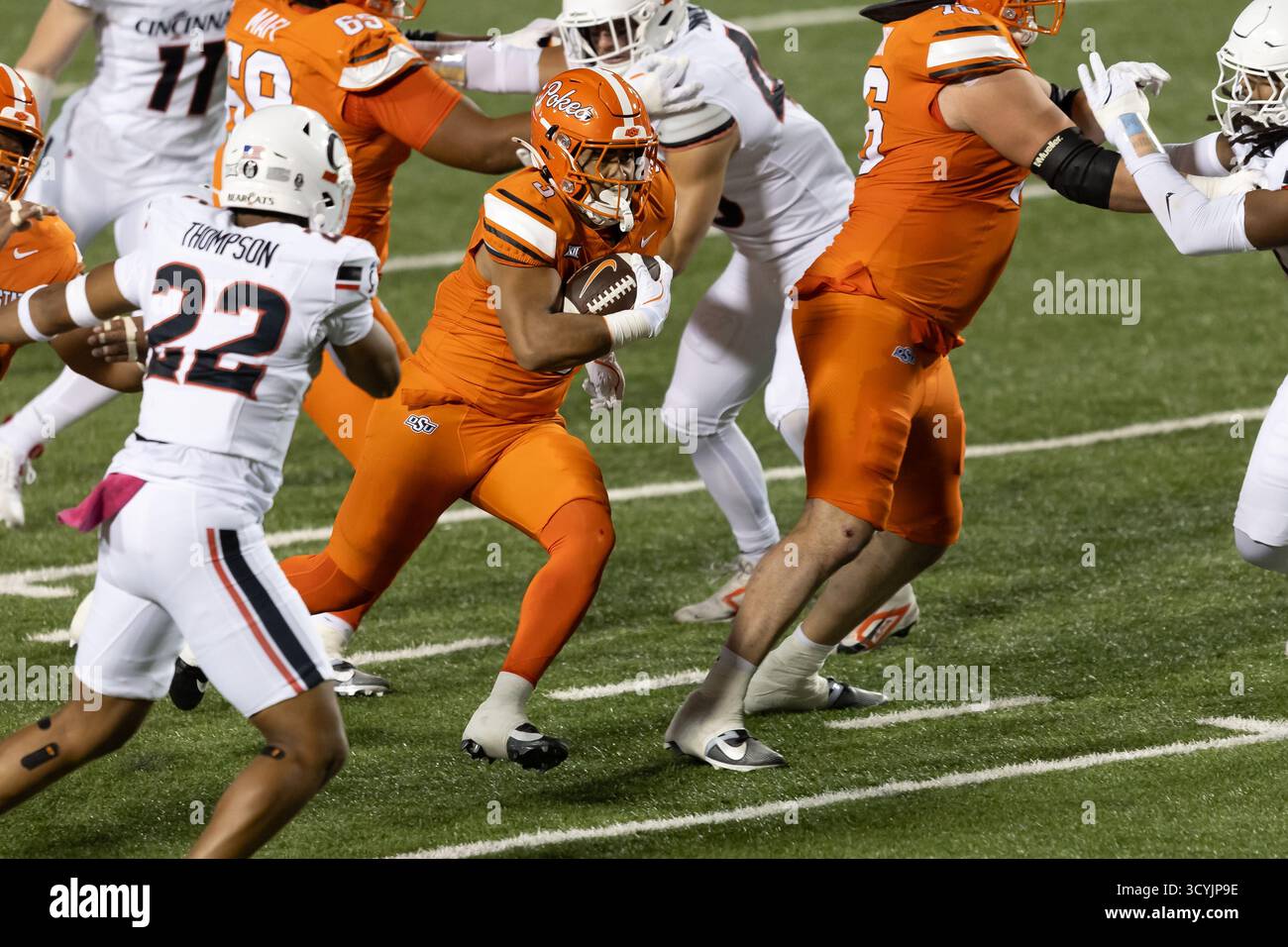 Oklahoma State running back Sesi Vailahi (3) runs the ball past ...