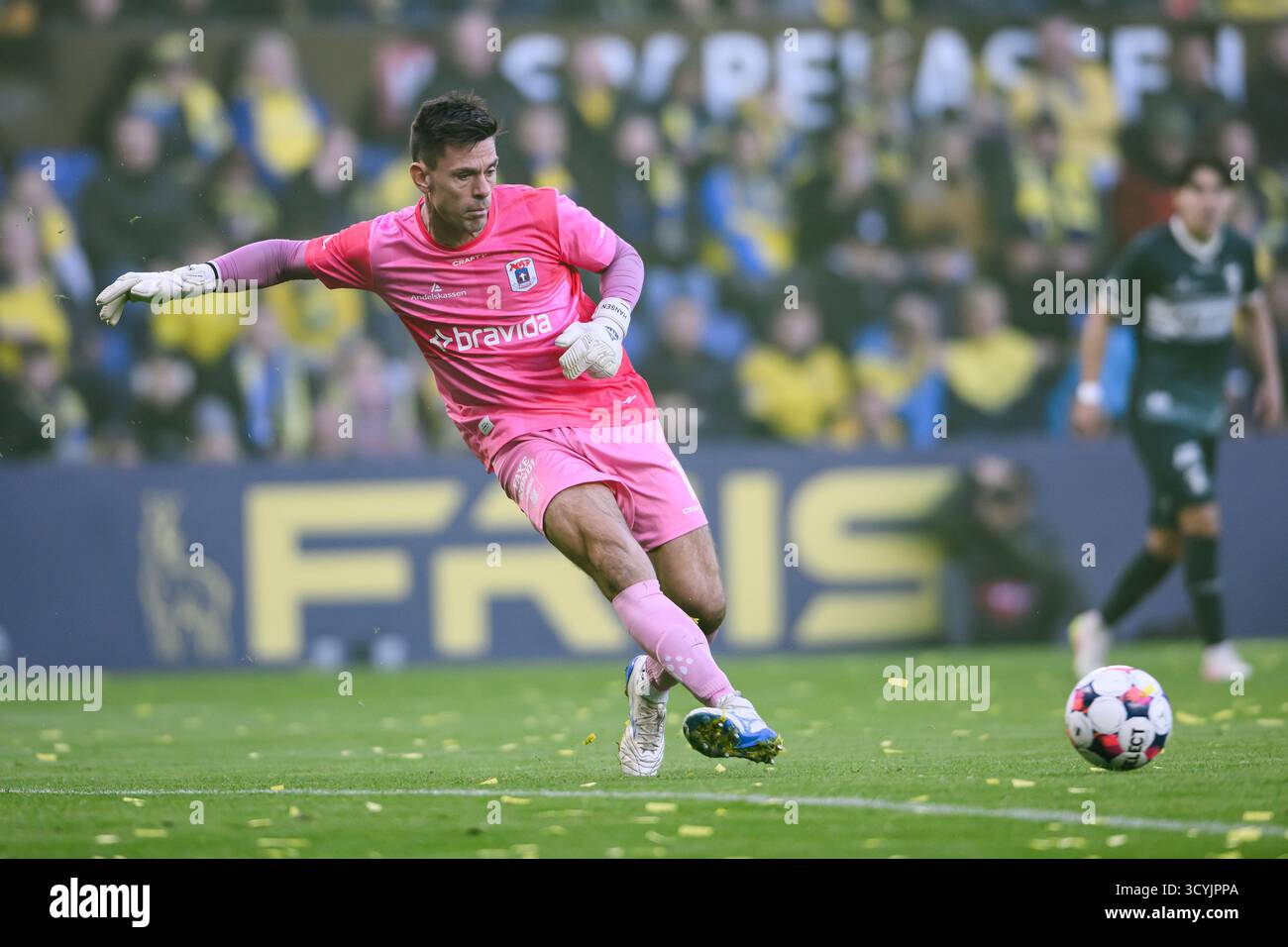 Brondby, Denmark. 19 October, 2025. Pictured left to right, 1 (AGF ...