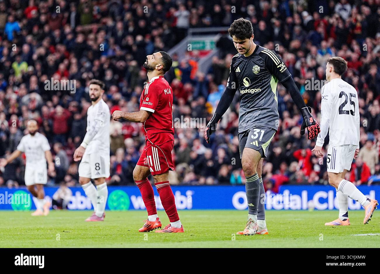 Liverpool's Mohamed Salah reacts after a missed opportunity during the ...