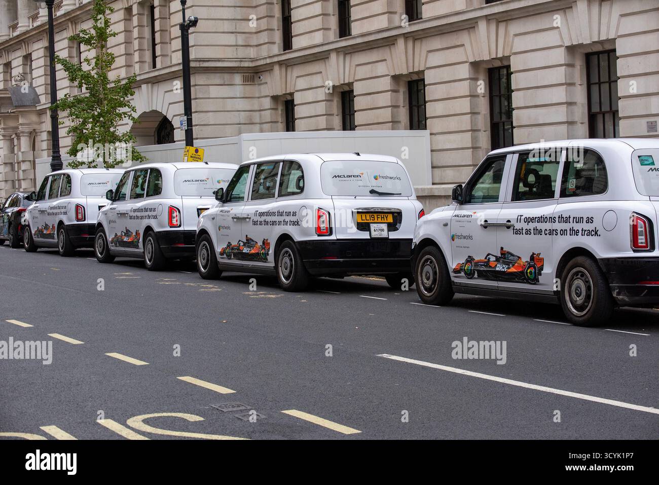 London, UK. 18th Oct, 2025. Taxis parked with advertisements on the ...