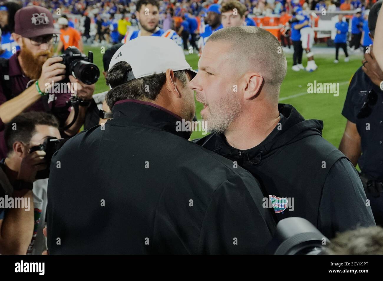 Mississippi State head coach Jeff Lebby, left, and Florida head coach ...
