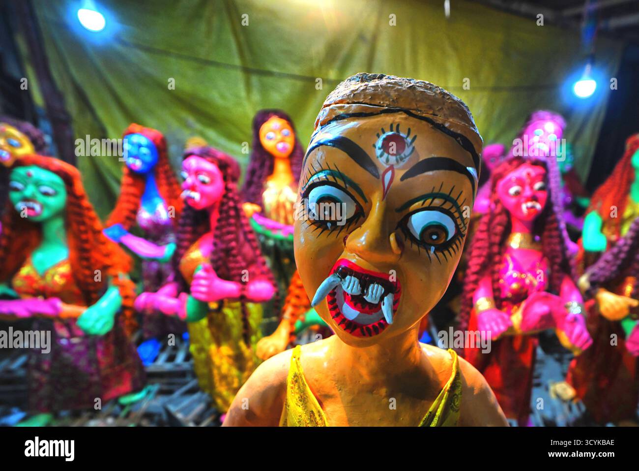 Demon clay sculptures seen kept on the roadside ahead of Kali puja ...