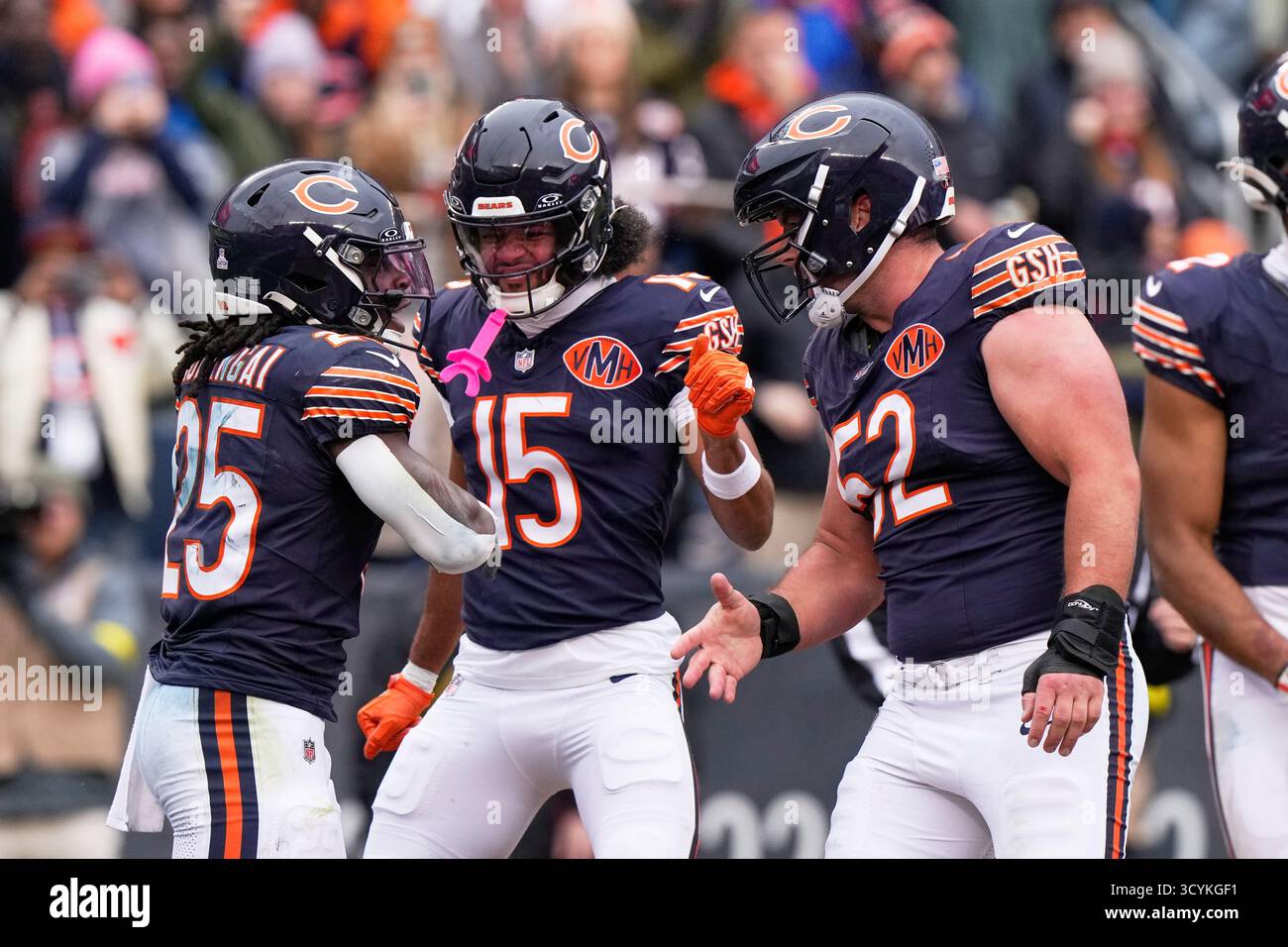 Chicago Bears running back Kyle Monangai (25) celebrates his touchdown ...