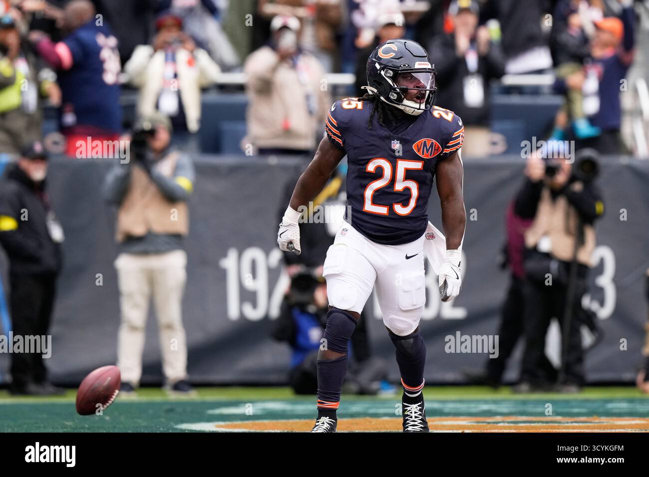 Chicago Bears running back Kyle Monangai (25) celebrates his touchdown ...