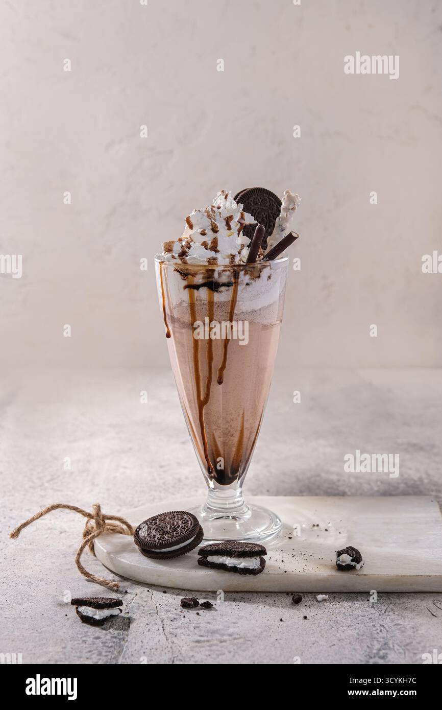 Enjoy chocolate milkshake topped whipped hi-res stock photography and ...