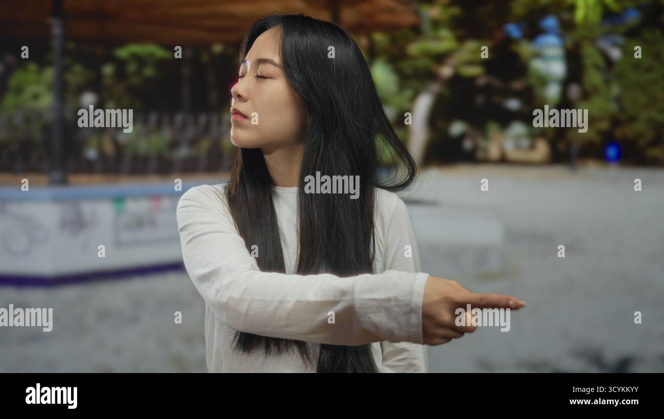 Woman making dismissive gesture outdoors hi-res stock photography and ...