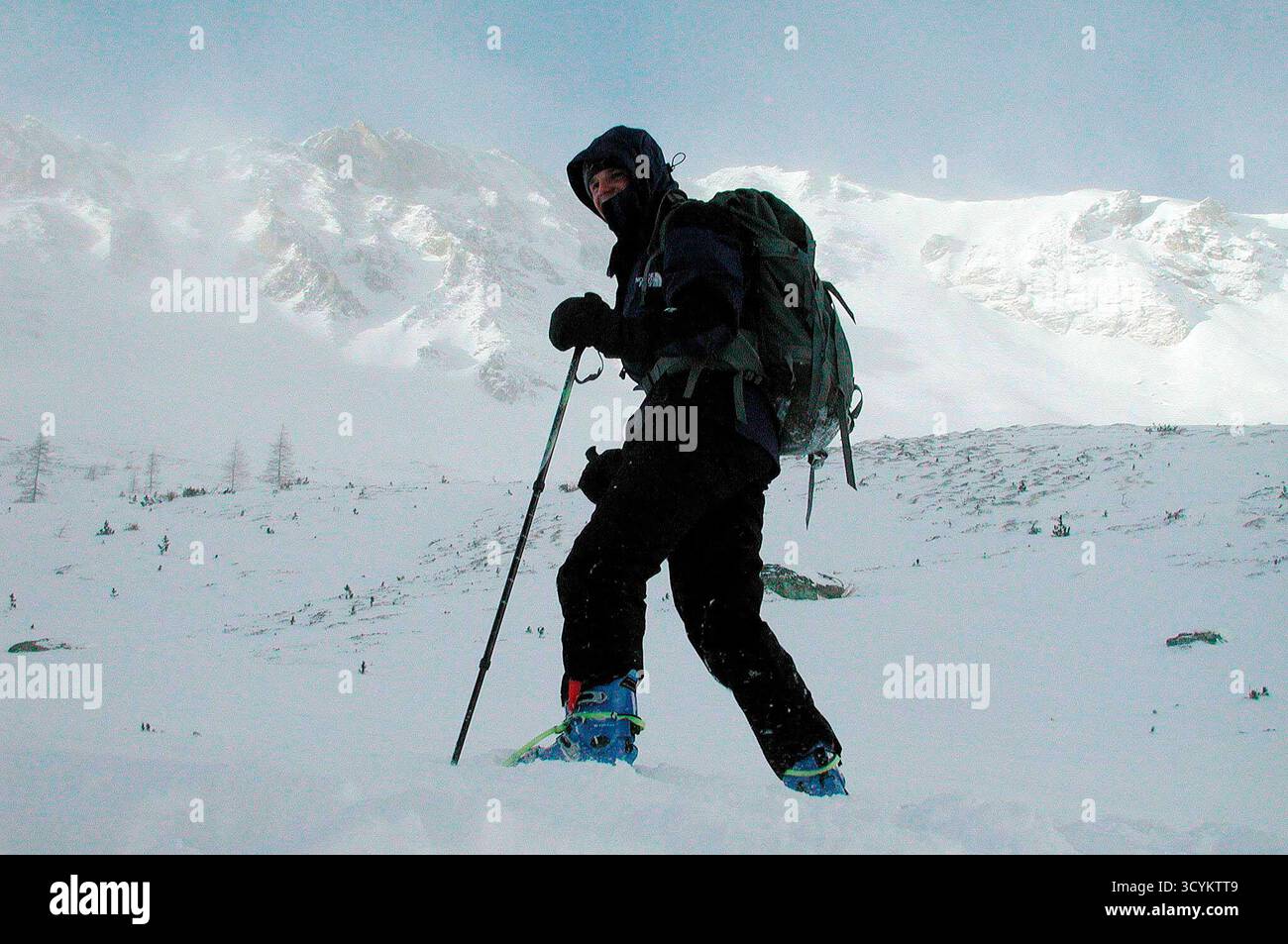 ski tour in winter on a mountain in the alps ski tour in winter in the ...