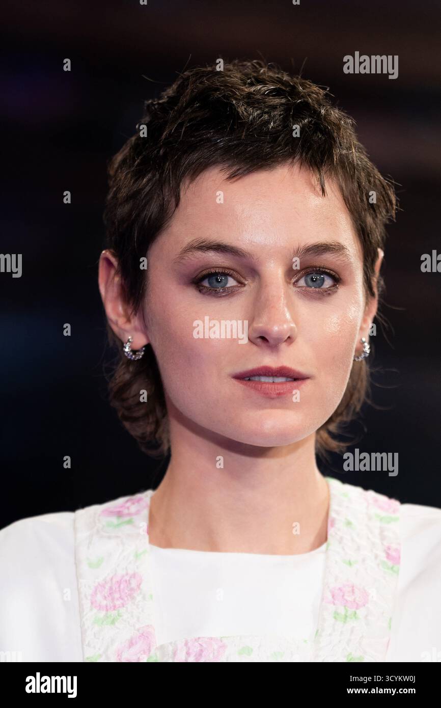 Emma Corrin poses for photographers upon arrival at the premiere of the ...