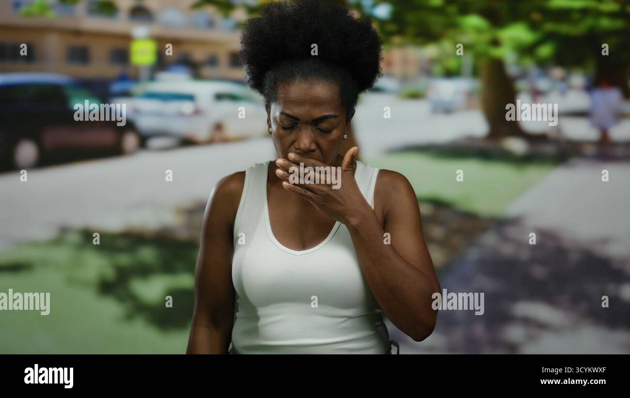 Woman yawning holding chest hi-res stock photography and images - Alamy