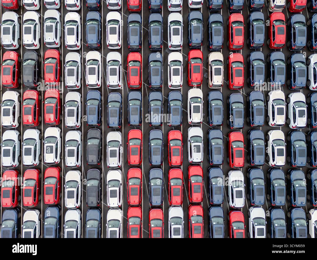 Cars at a dock car park shot by drone Stock Photo - Alamy