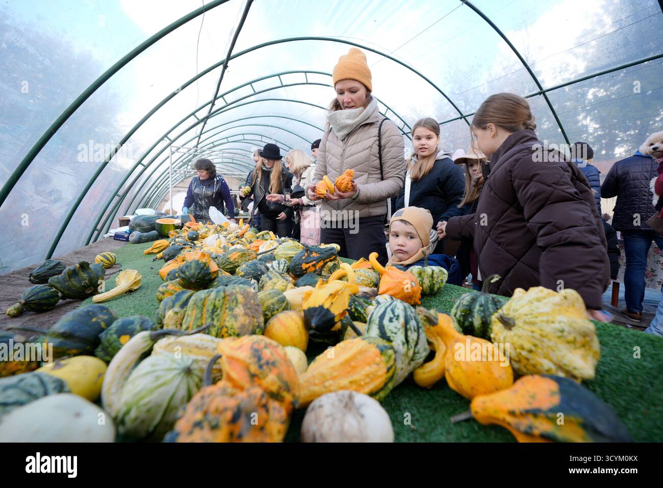 Vistiors are seen at the annual Pumpkin Festival at the Folwark Brodno ...