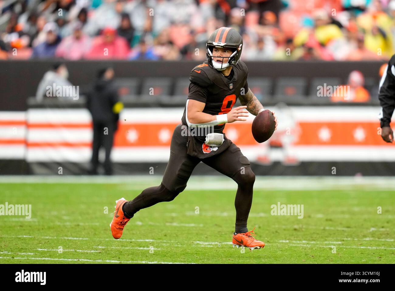 Cleveland Browns quarterback Dillon Gabriel scrambles against the Miami ...
