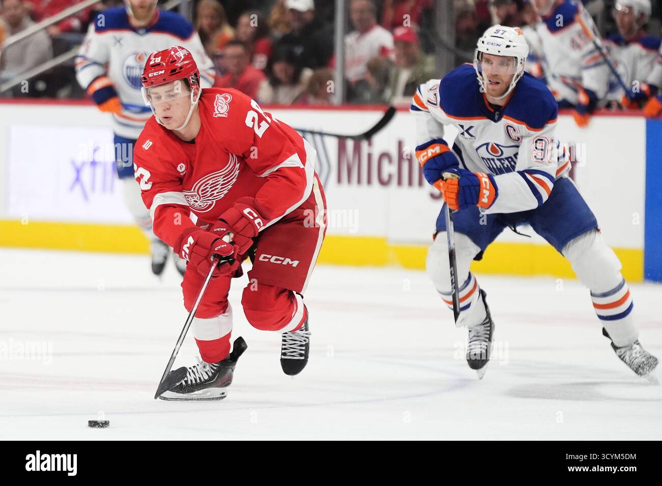 Detroit Red Wings right wing Michael Brandsegg-Nygård, left, moves the ...