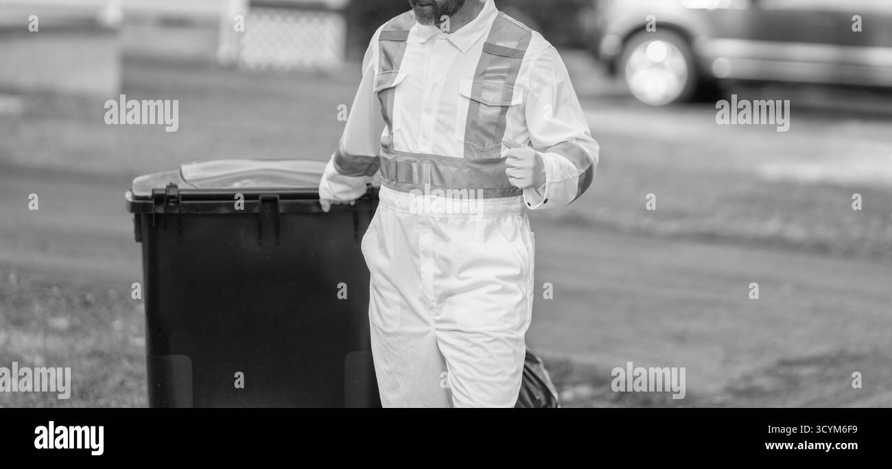 Man carrying plastic bag Black and White Stock Photos & Images - Alamy