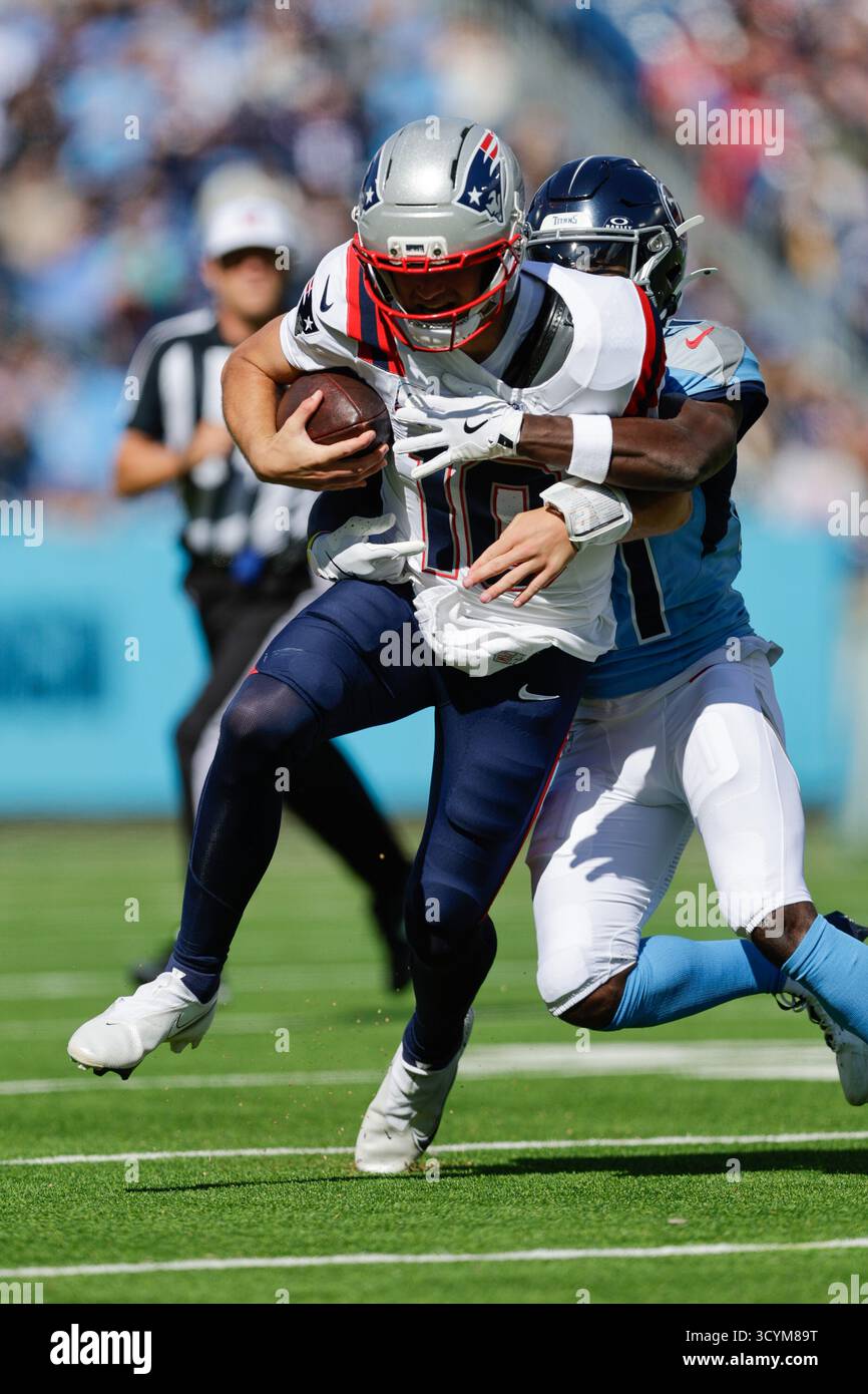 New England Patriots quarterback Drake Maye (10) is tackled by ...