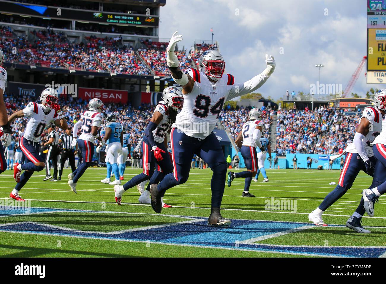 New England Patriots defensive lineman Cory Durden (94) celebrates and ...