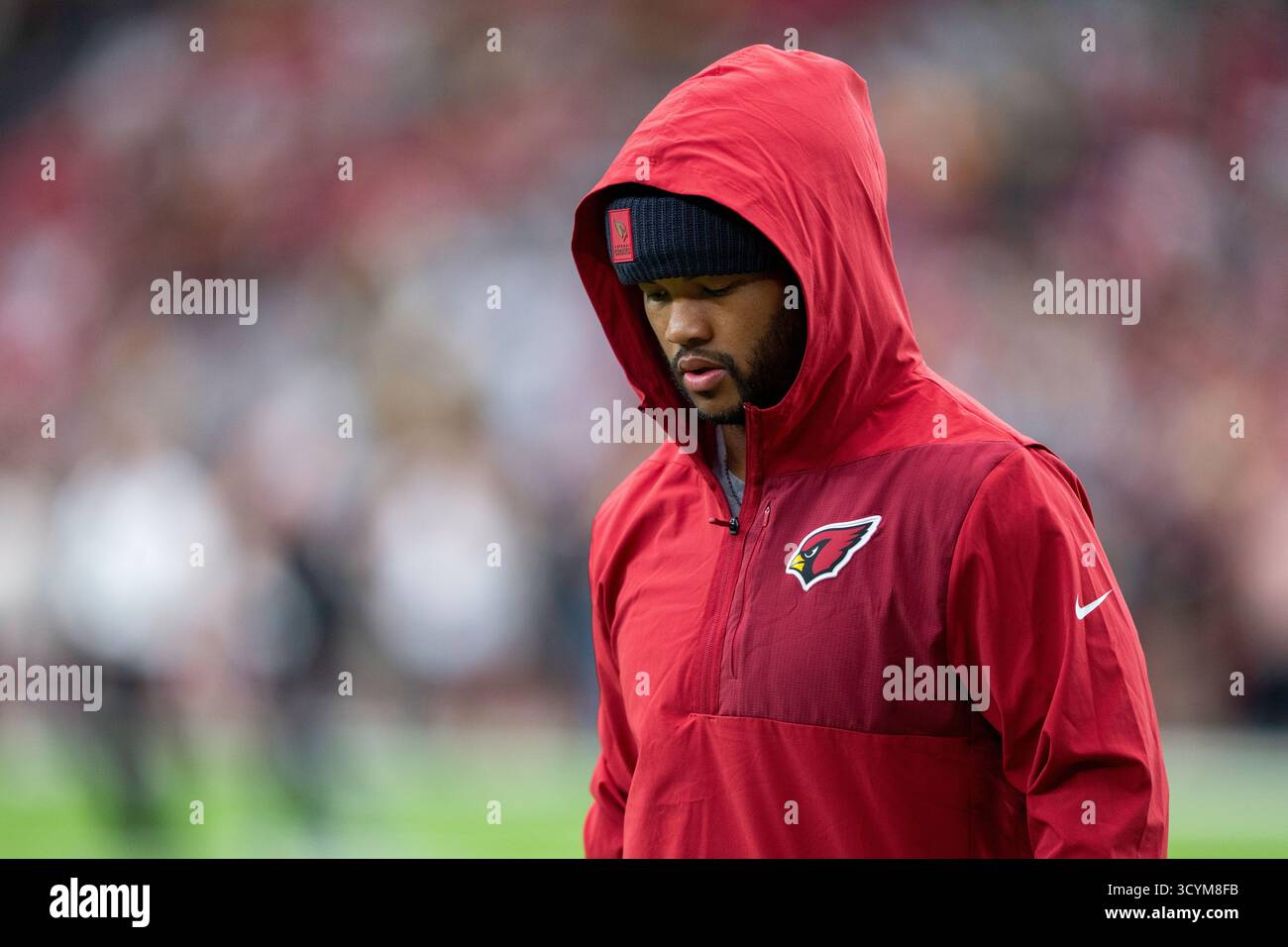 Arizona Cardinals quarterback Kyler Murray looks down before an NFL ...