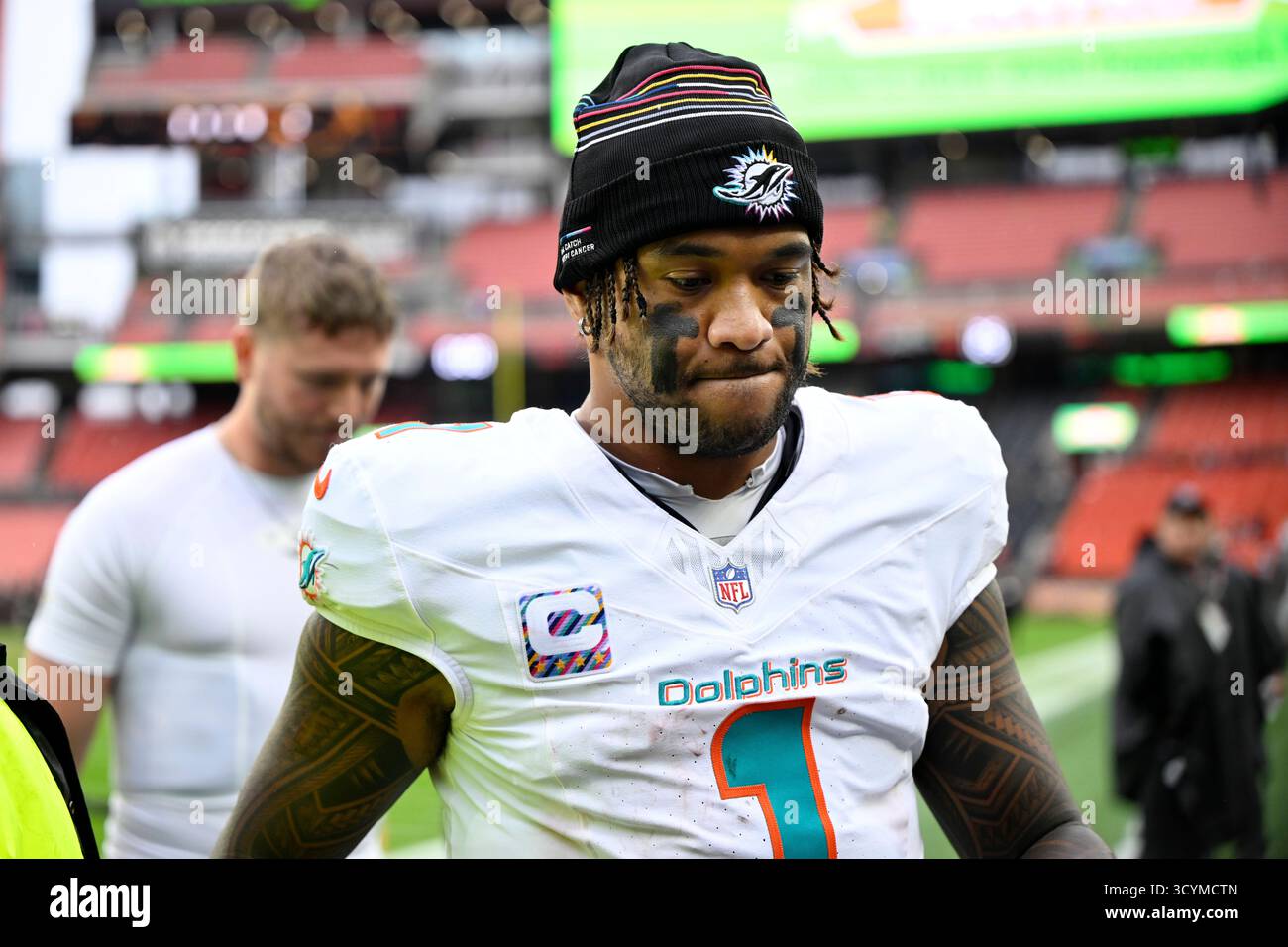 Miami Dolphins quarterback Tua Tagovailoa leaves the field after a loss ...