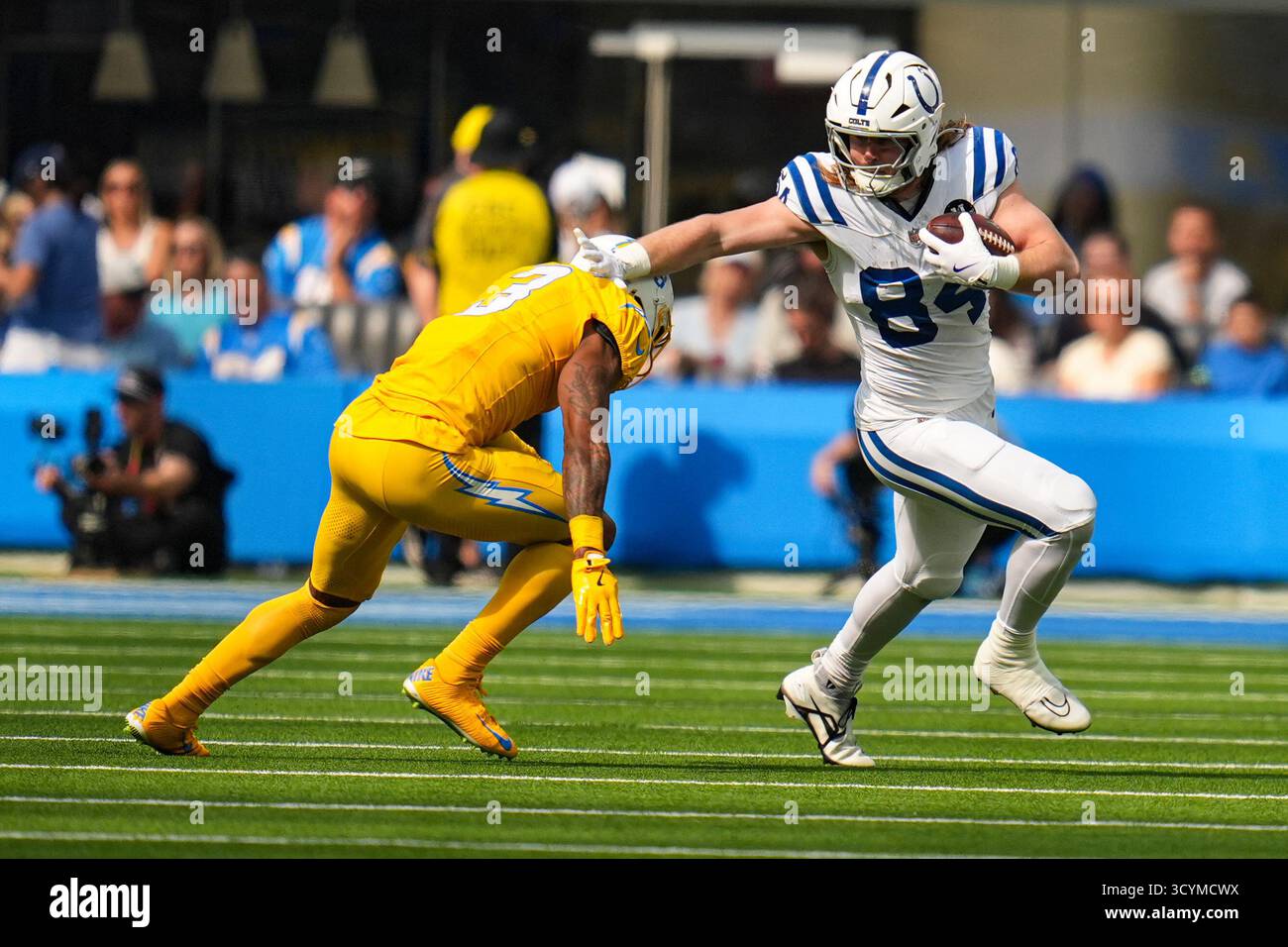 Indianapolis Colts tight end Tyler Warren (84) pushes off Los Angeles ...