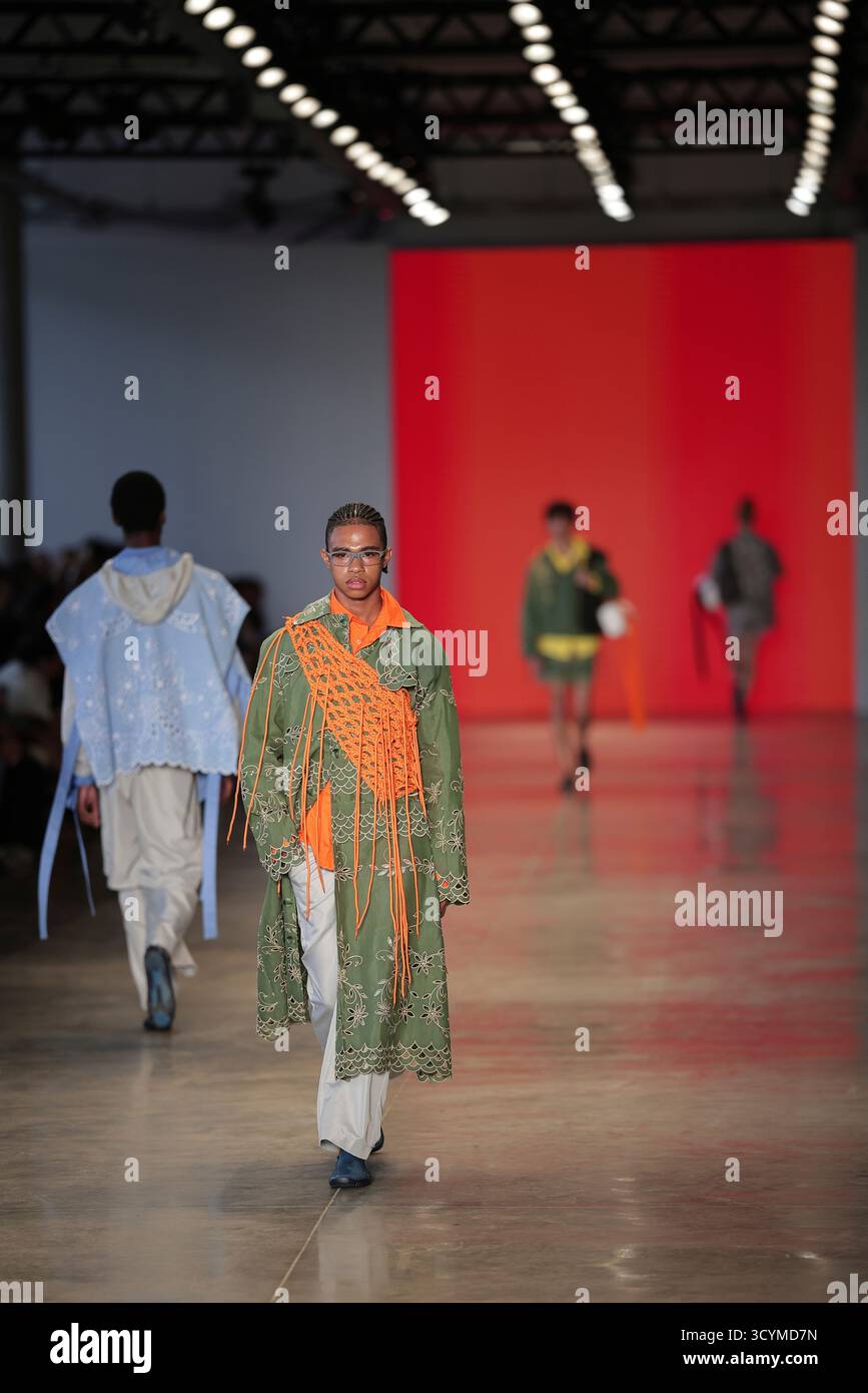 A model wears creation from the David Lee collection during the Sao ...