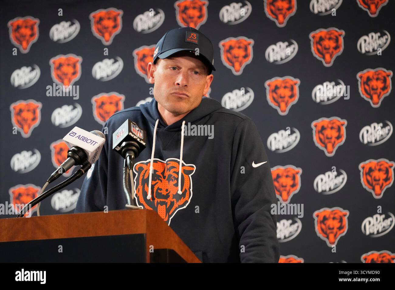 Chicago Bears head coach Ben Johnson talks to reporters after an NFL ...