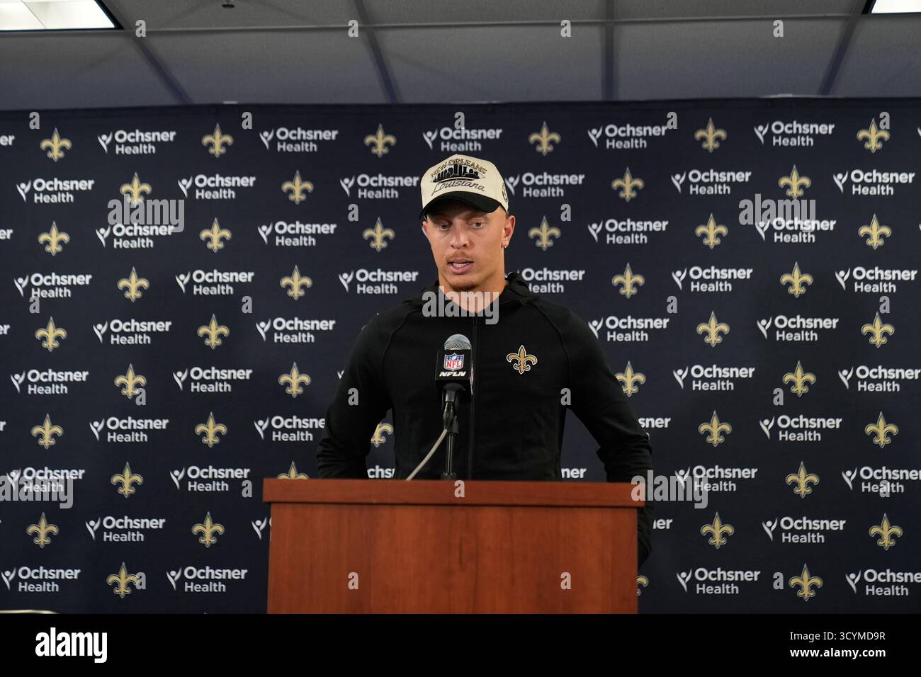 New Orleans Saints quarterback Spencer Rattler talks to reporters after ...