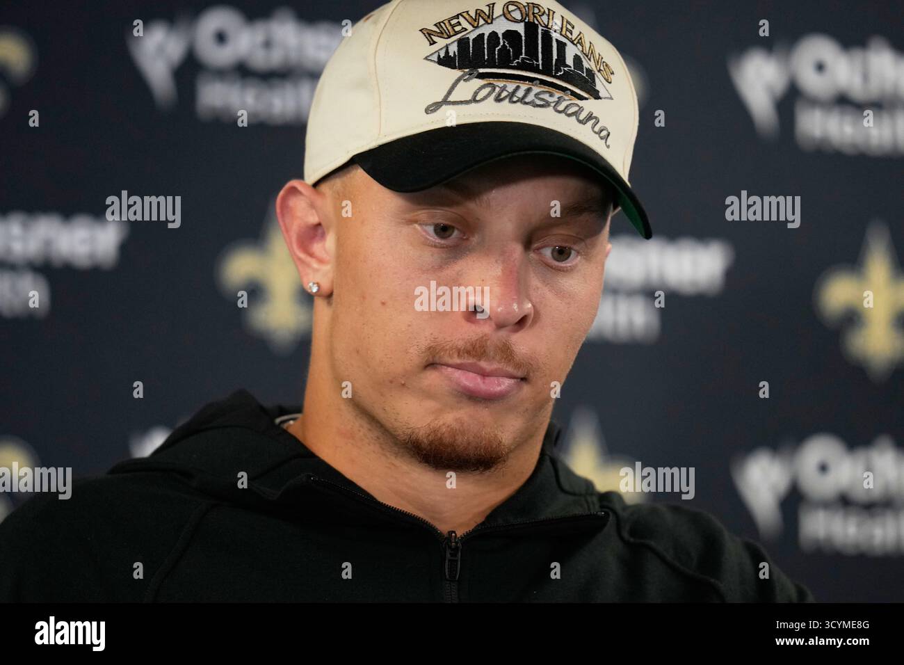 New Orleans Saints quarterback Spencer Rattler talks to reporters after ...
