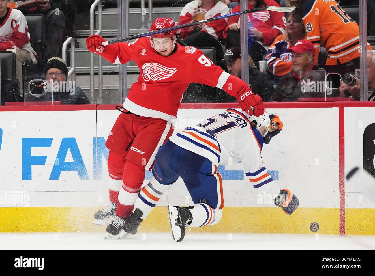 Detroit Red Wings center Marco Kasper, left, collides with Edmonton ...