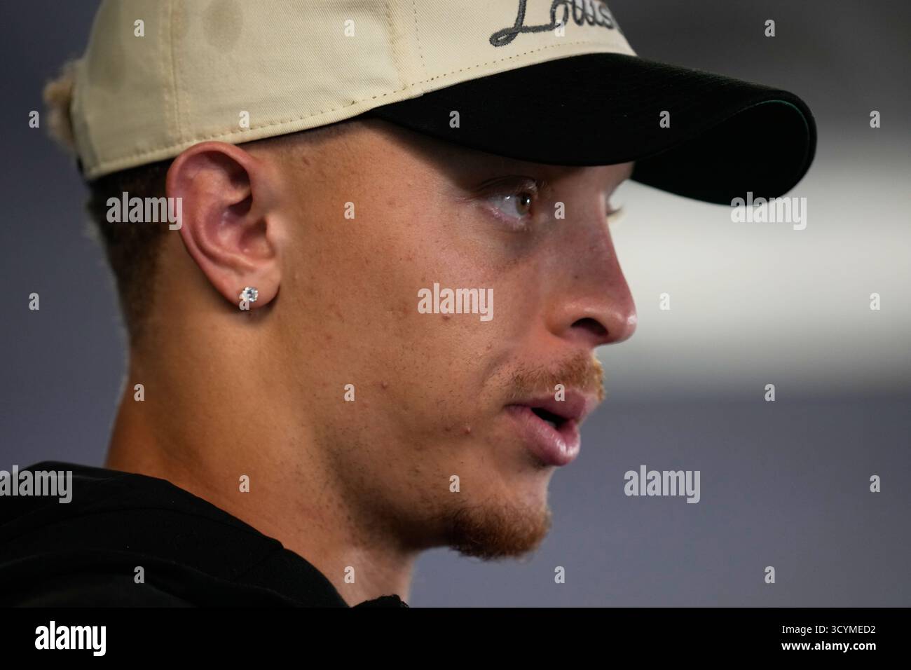 New Orleans Saints quarterback Spencer Rattler talks to reporters after ...