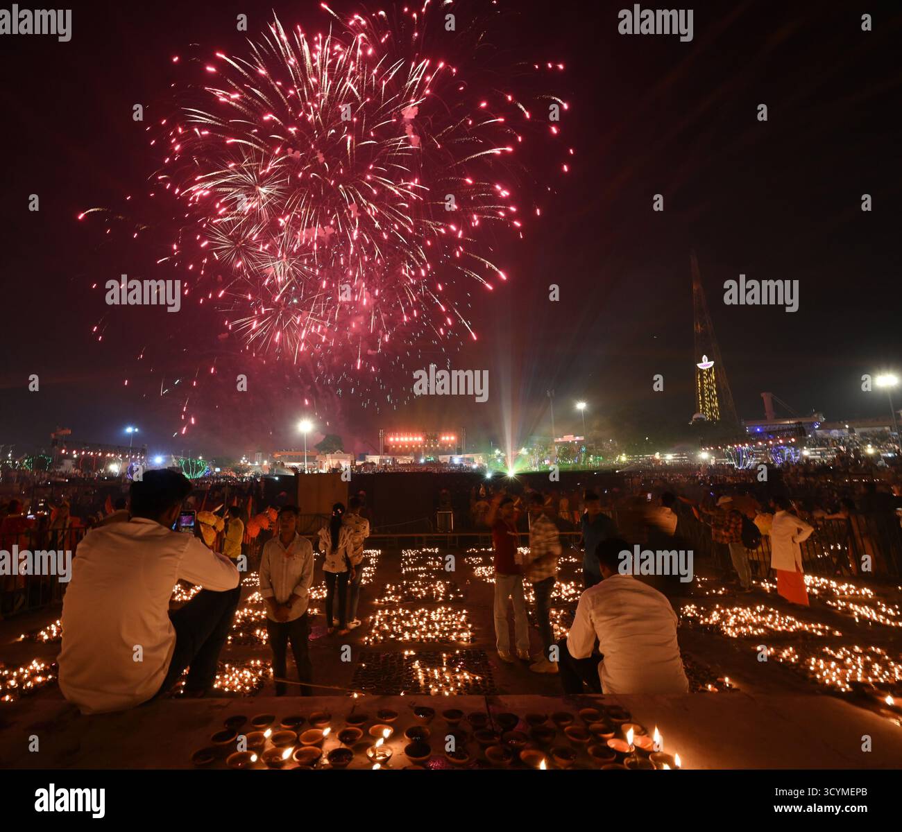 AYODHYA, INDIA - OCTOBER 19: Fireworks illuminate the sky over Ram Ki ...