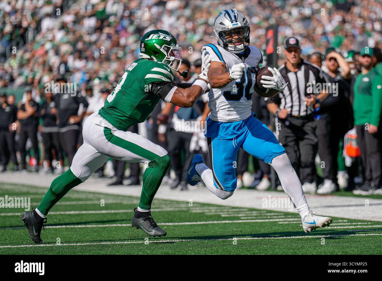New York Jets safety Andre Cisco (8) pushes Carolina Panthers running ...