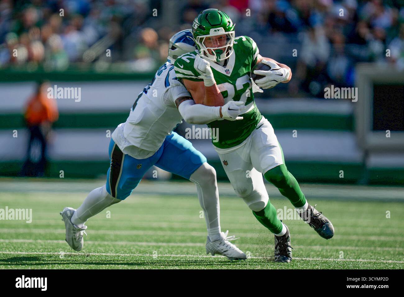 New York Jets running back Isaiah Davis (32) is tackled by Carolina ...