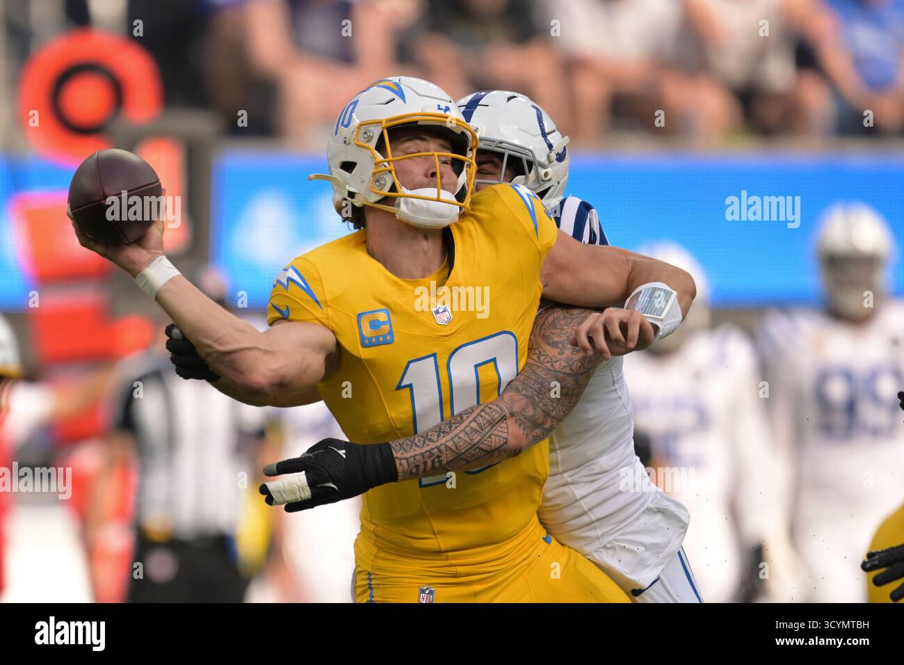 Los Angeles Chargers quarterback Justin Herbert (10) is sacked by ...