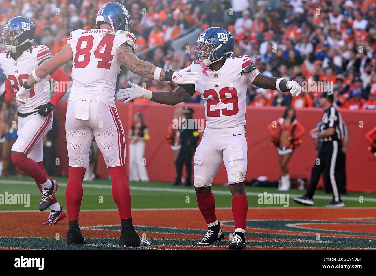 New York Giants running back Tyrone Tracy Jr. (29) is congratulated by ...