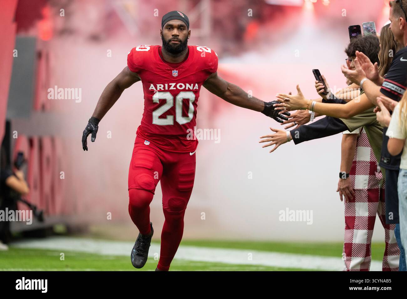 Arizona Cardinals running back Bam Knight (20) runs out on to the field ...