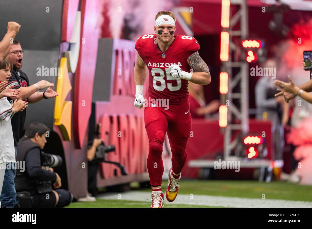 Arizona Cardinals tight end Trey McBride (85) runs out on to the field ...