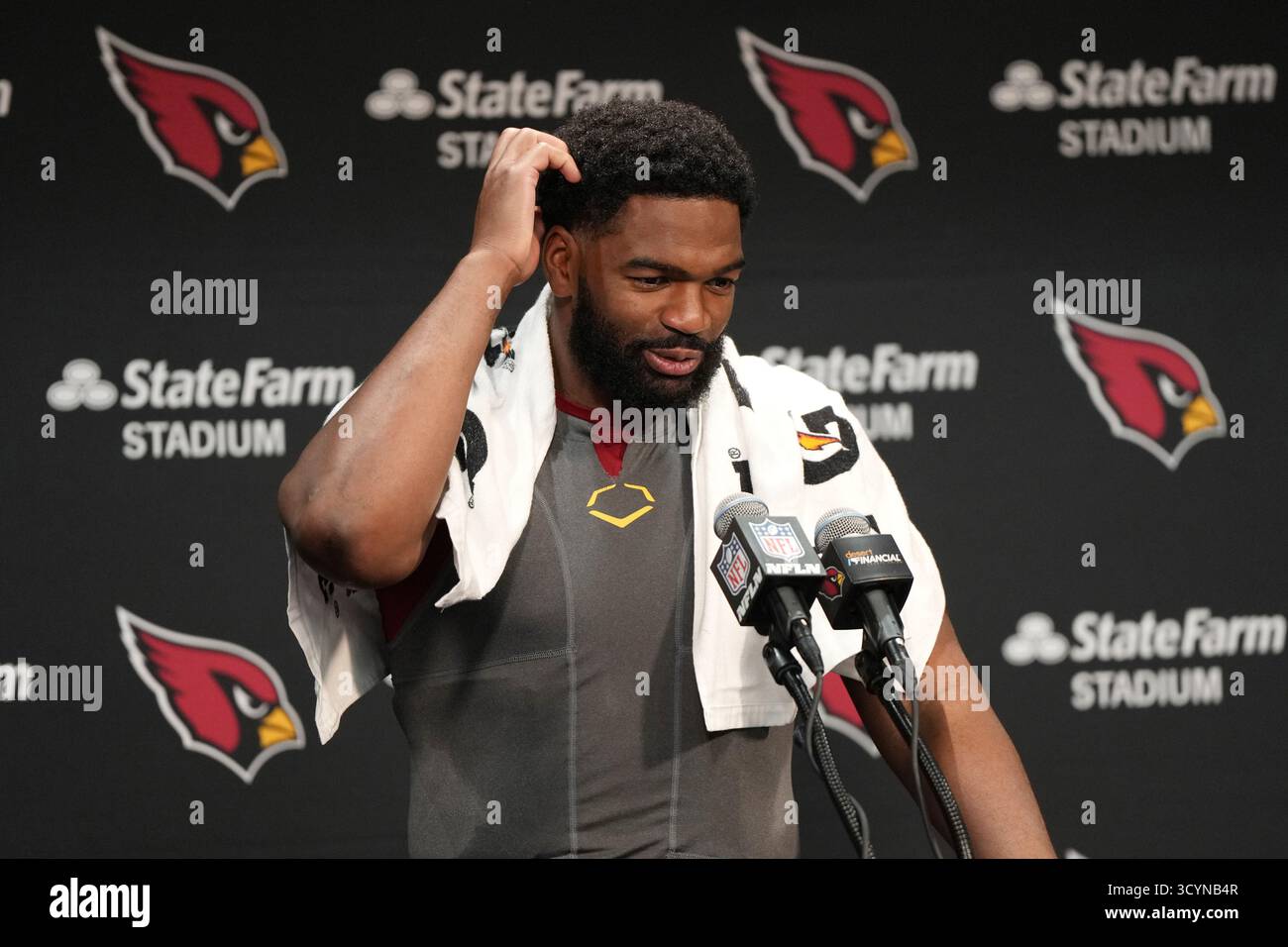 Arizona Cardinals quarterback Jacoby Brissett answers a question during ...
