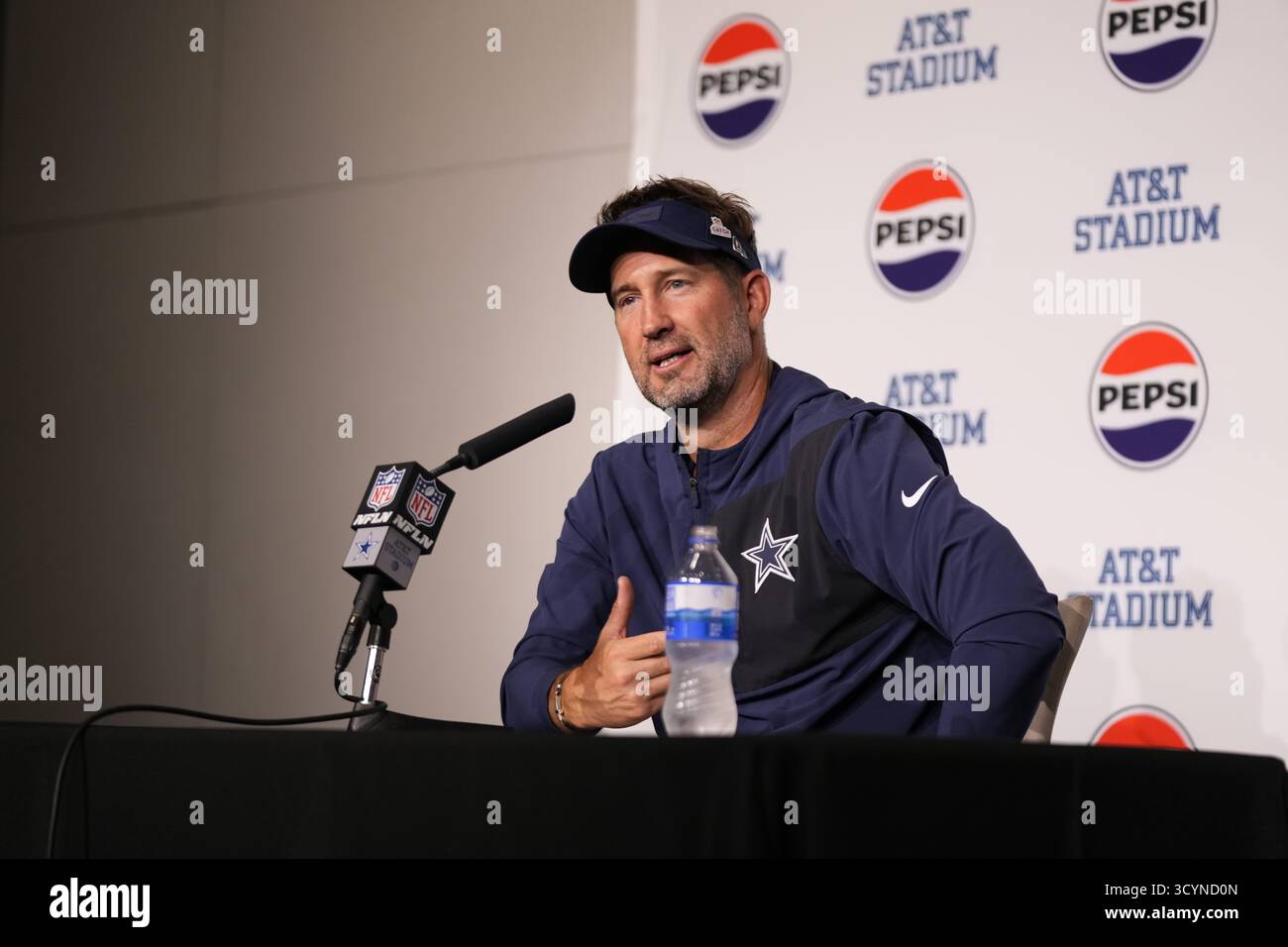 Dallas Cowboys head coach Brian Schottenheimer speaks to reporters following an NFL football ...
